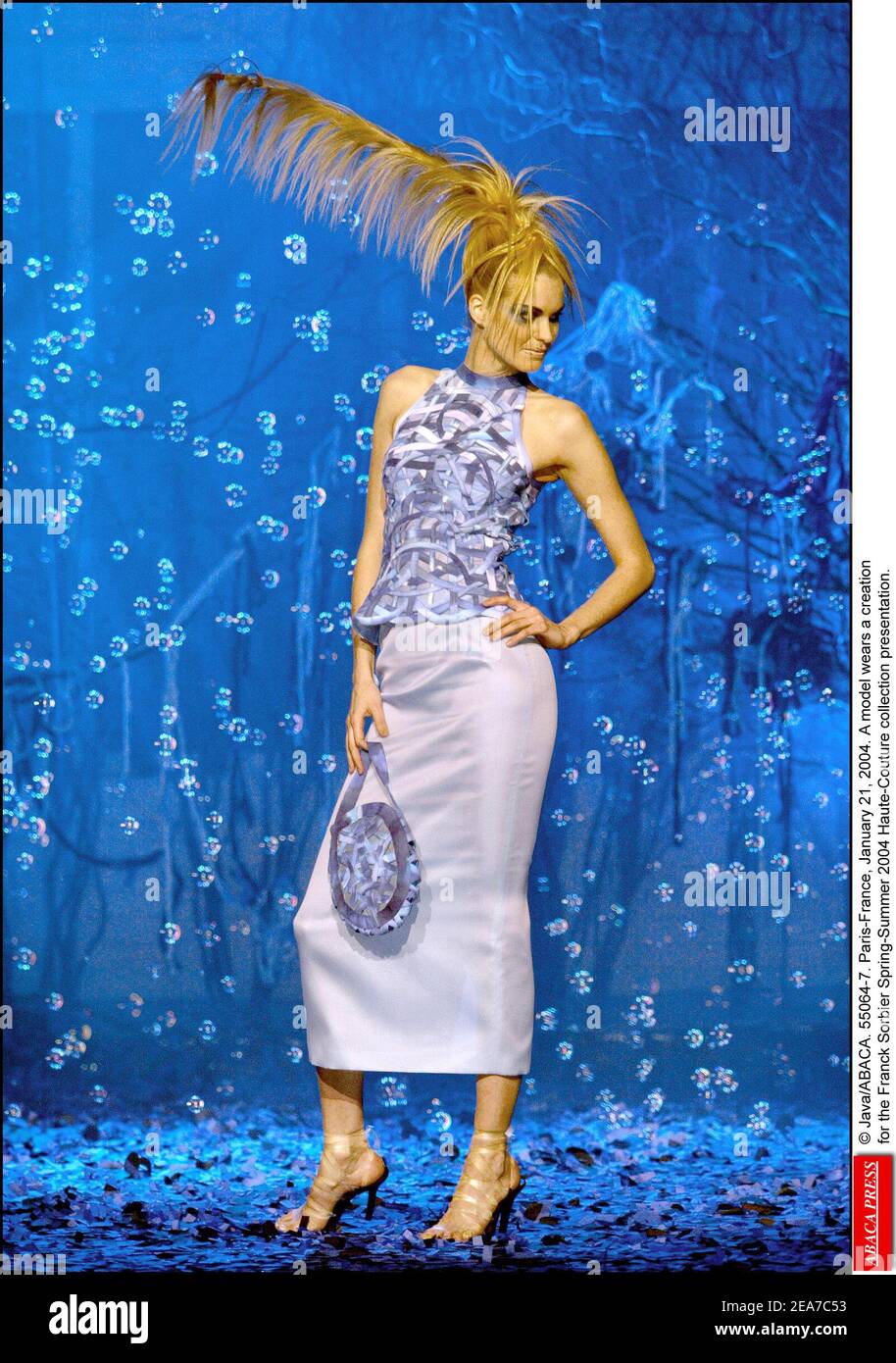 © Java/ABACA. 55064-7. Paris-France, January 21, 2004. A model wears a ...