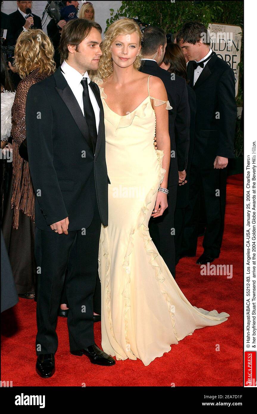 Charlize Theron and Stuart Townsend arrive at the 2004 Golden Globe ...