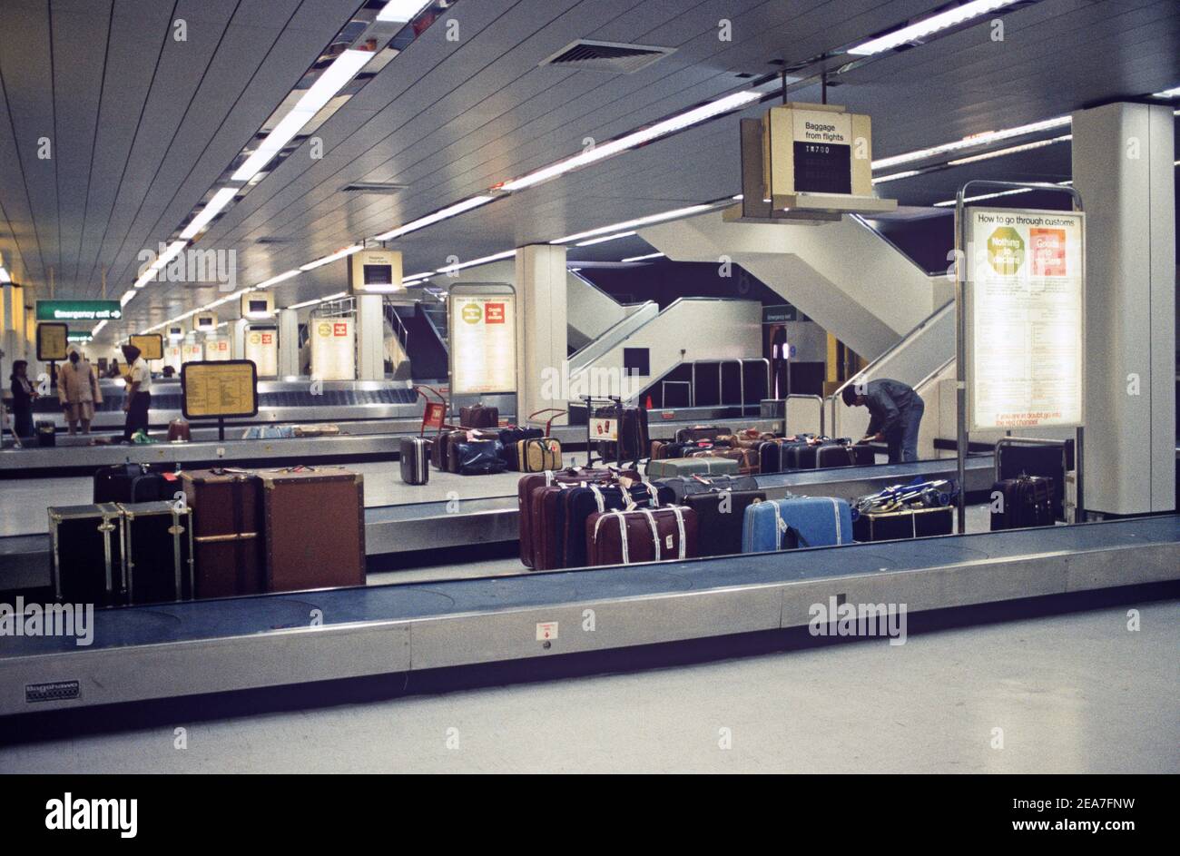 Baggage hall conveyor belt, Heathrow Airport, 1980s Stock Photo - Alamy