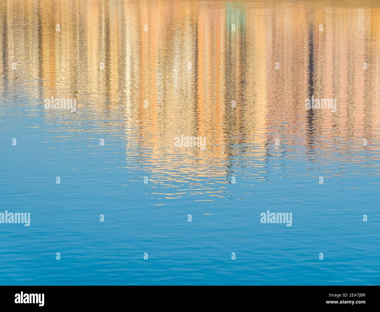 Abstract water reflection picture. Apartment buildings reflecting in ...