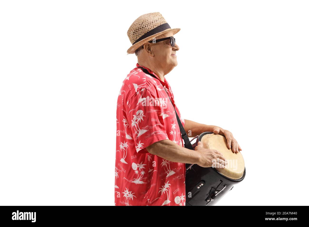 Casual mature man playing conga drums isolated on white background ...