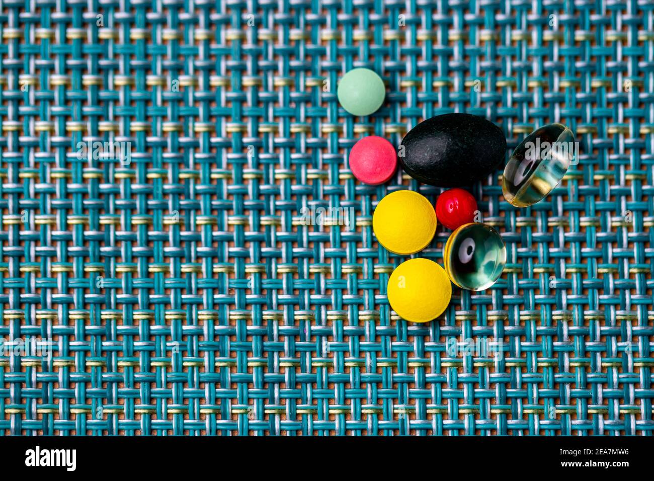 Lots of pills on the table for various illnesses Stock Photo - Alamy