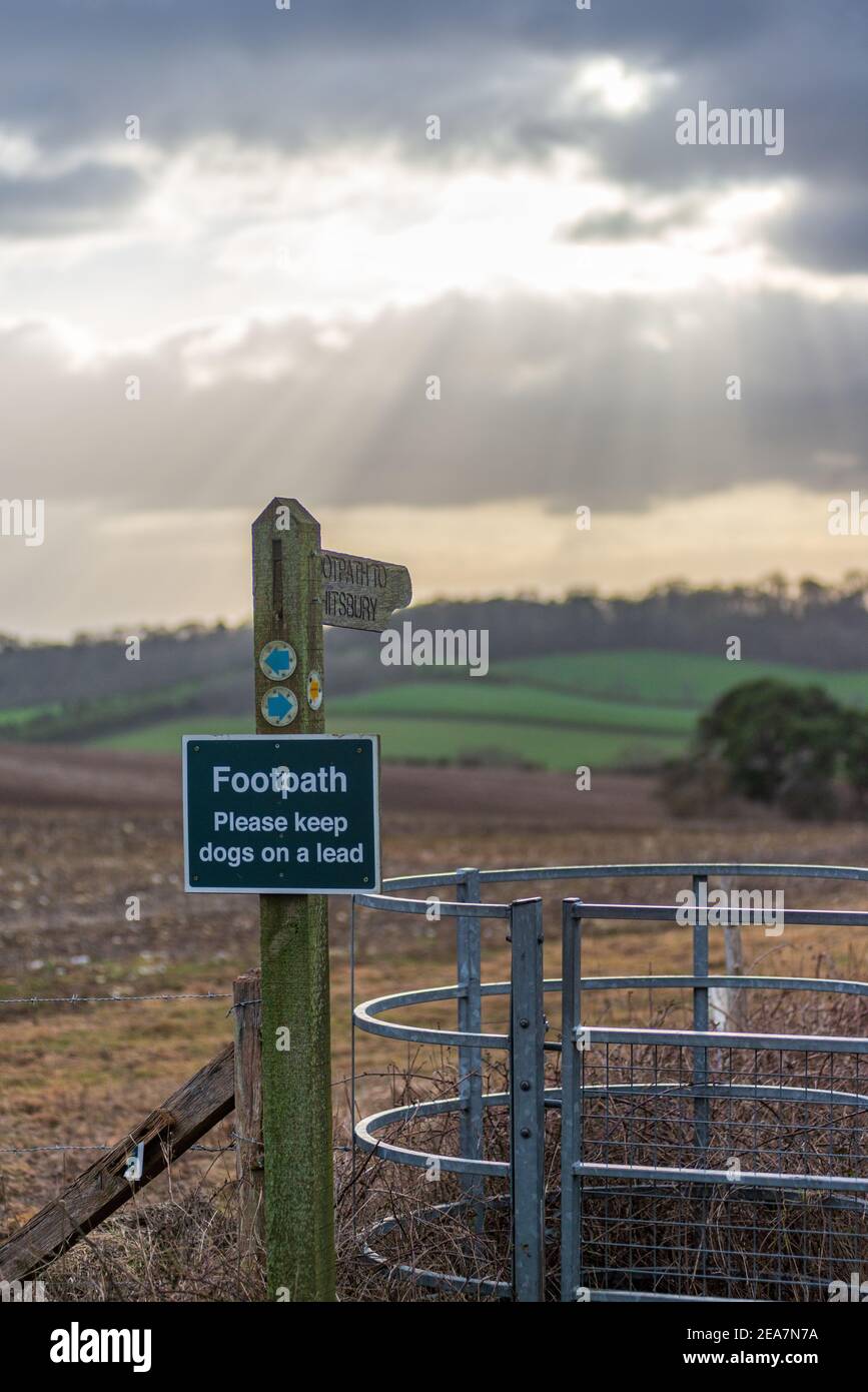 Footpath sign and metal stile, Hampshire, UK Stock Photo - Alamy