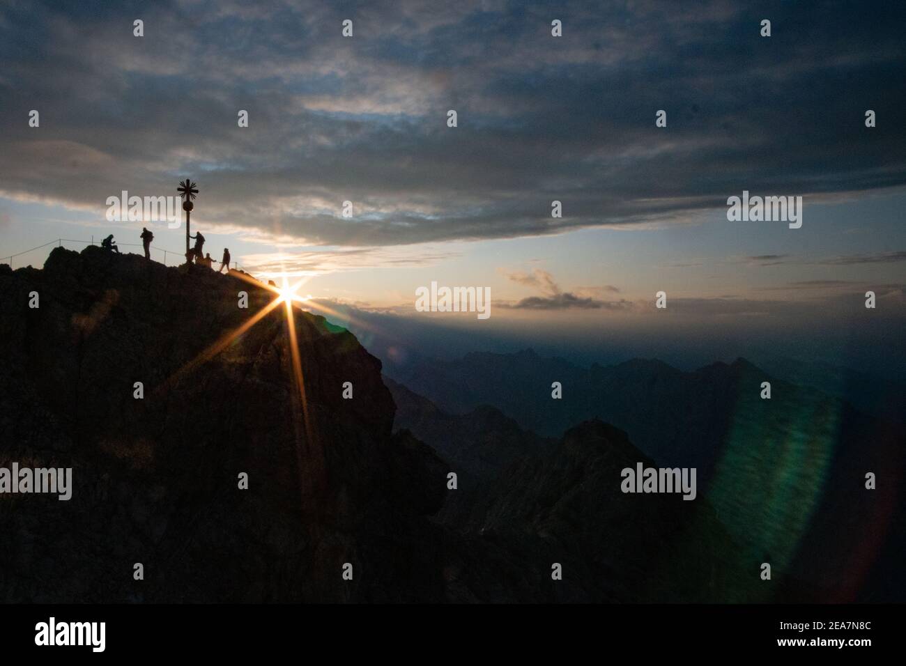Sunset at the summit of Zugspitze mountain in the alps Stock Photo - Alamy