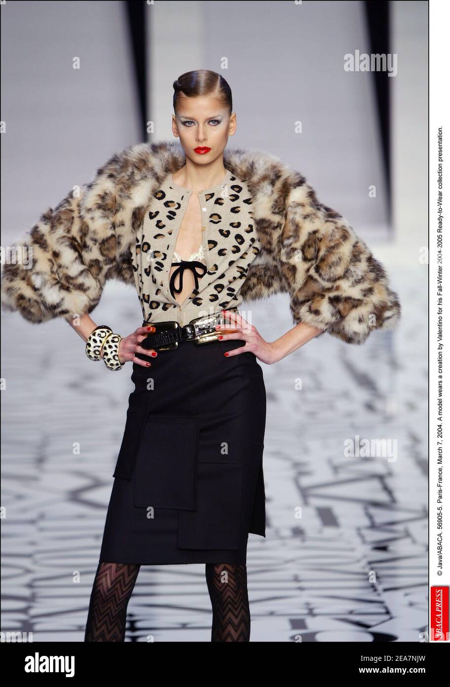 © Java/ABACA. 56905-5. Paris-France, March 7, 2004. A model wears a ...