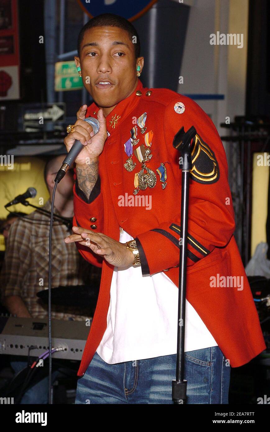 Pharrell Williams of NERD performs live during an in store appearance ...