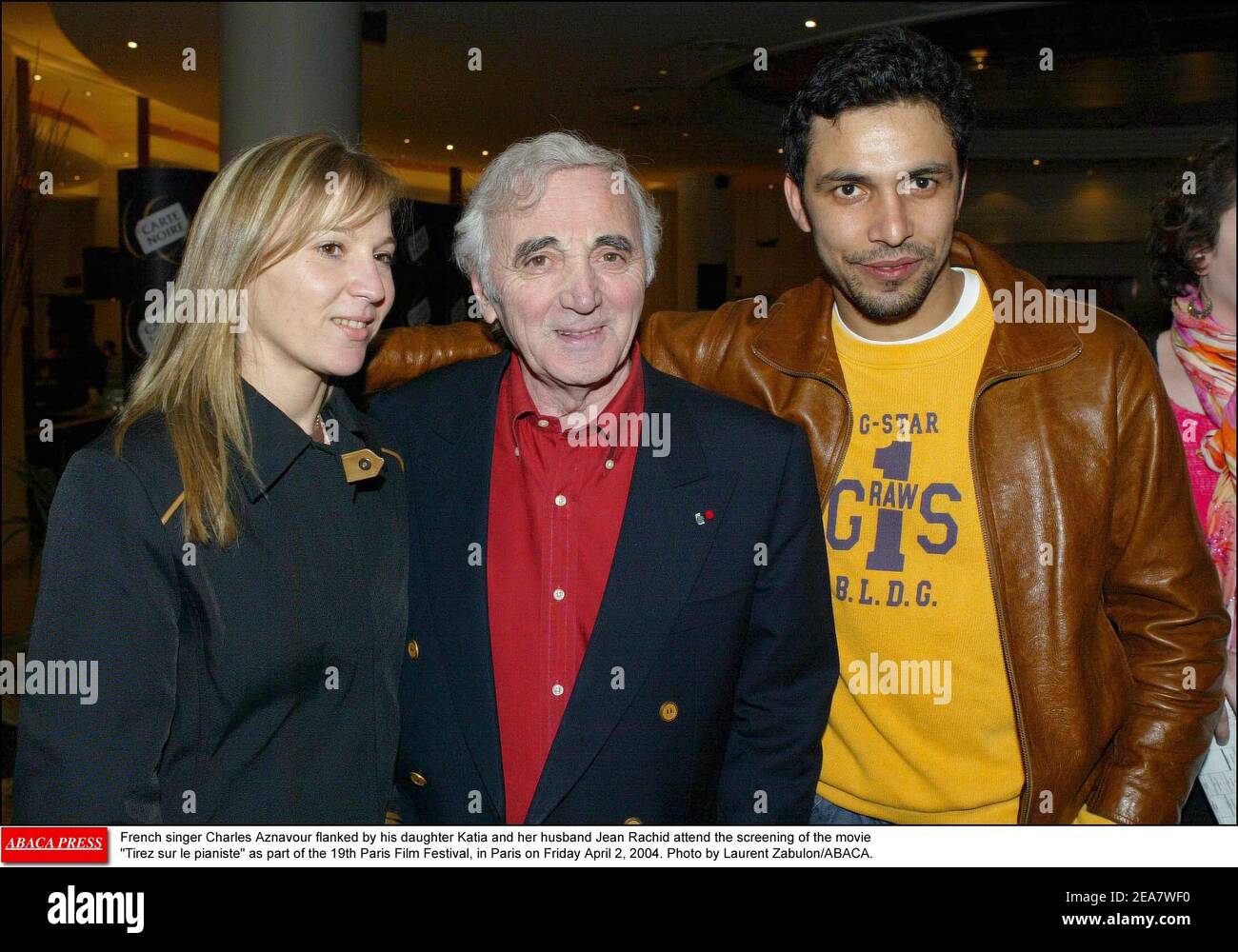French singer Charles Aznavour flanked by his daughter Katia and her ...