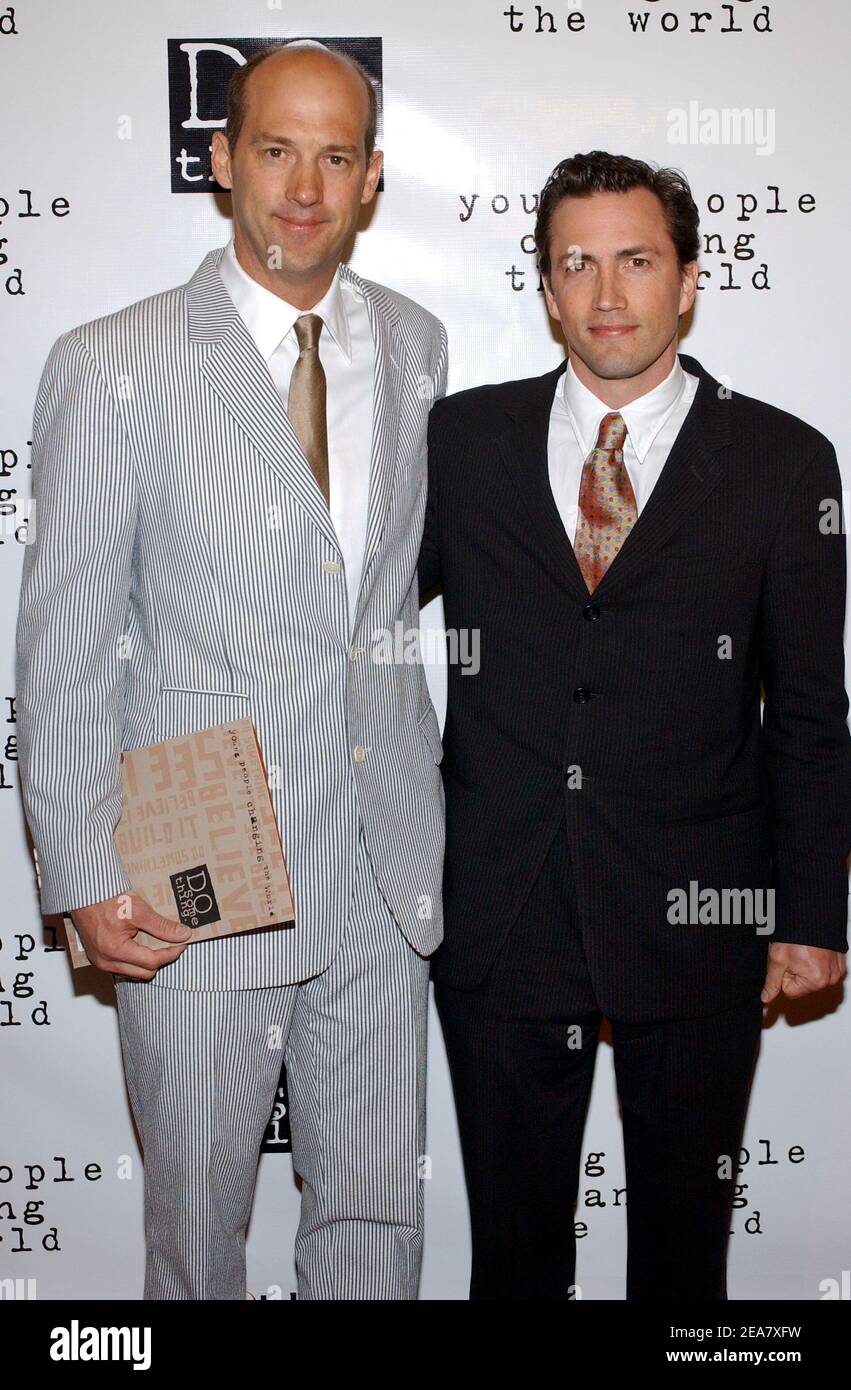 Anthony Edwards (left) and Andrew Shue (right) pose as they arrive at ...