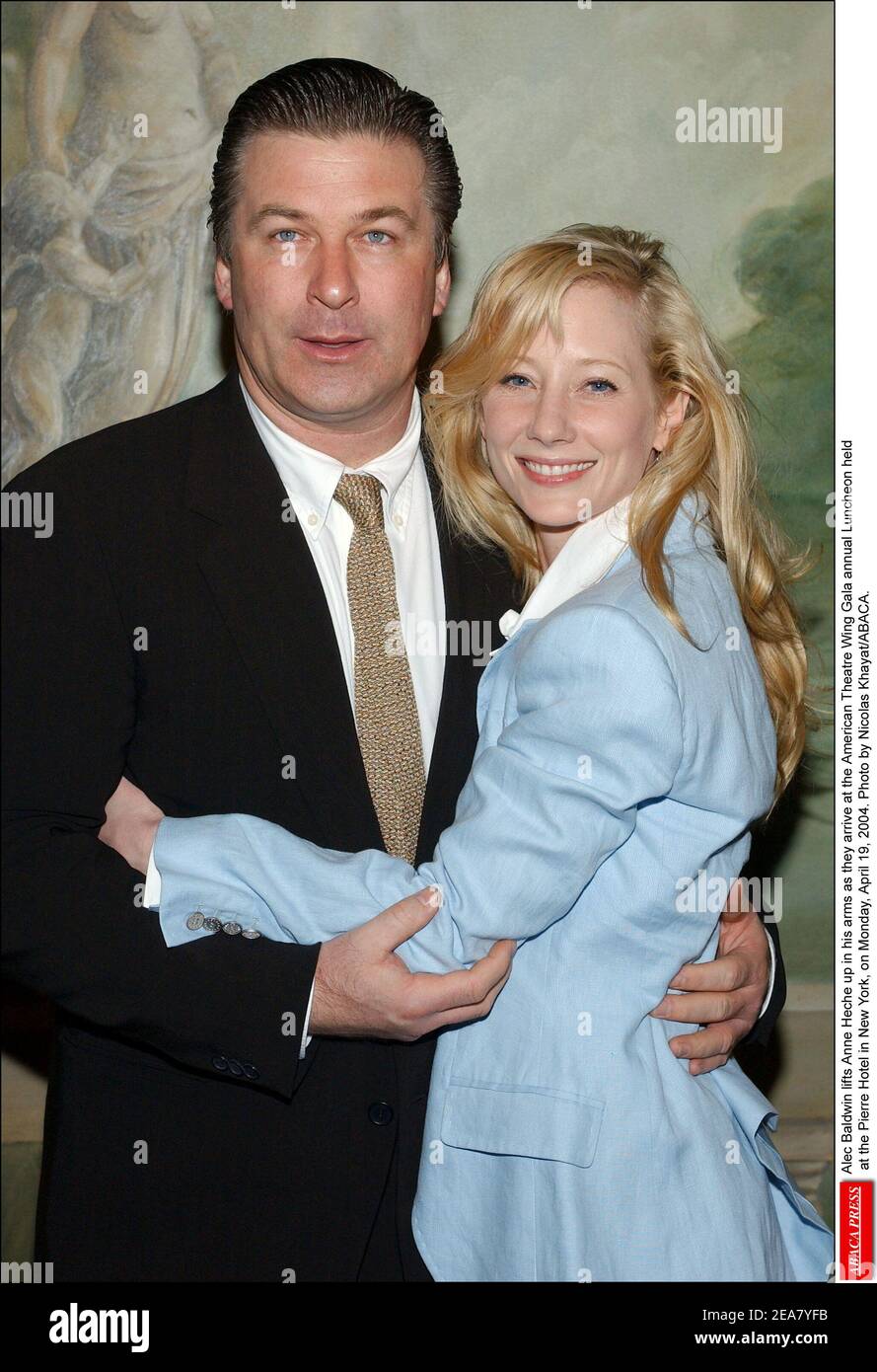 Alec Baldwin lifts Anne Heche up in his arms as they arrive at the ...