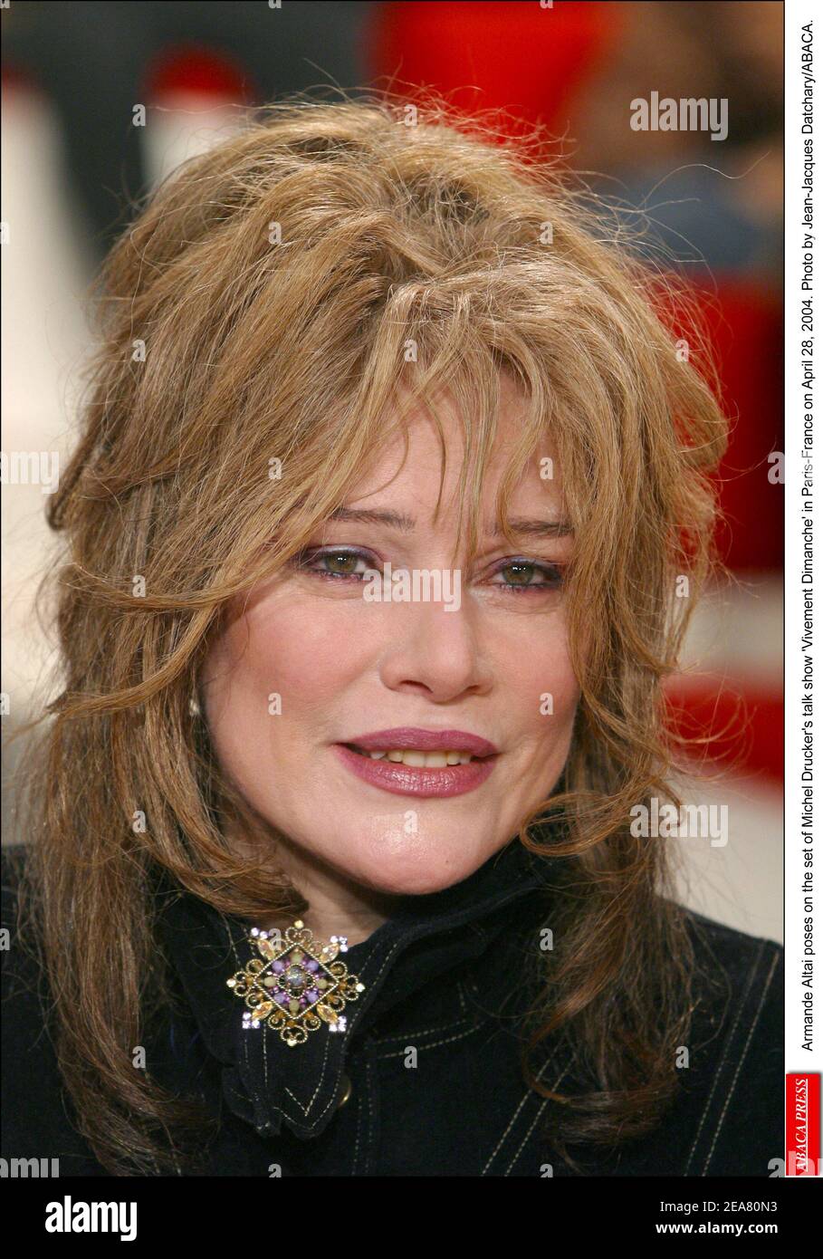 Armande Altai poses on the set of Michel Drucker's talk show 'Vivement ...