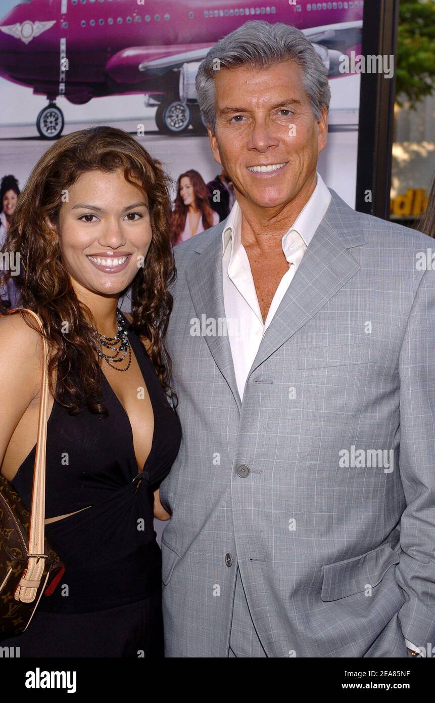 Michael Buffer and his date arrive on the purple carpet at the Soul ...