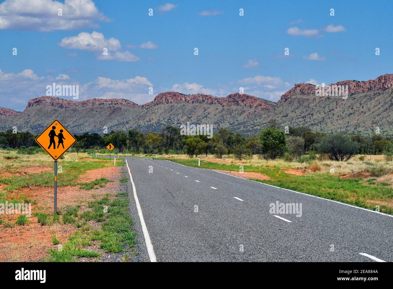Australia, NT, warning sign for bus stop on Larapinta drive along ...