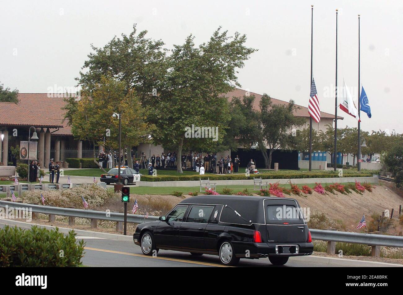 The body of Ronald Reagan accompanied by a fragile Nancy Reagan ...