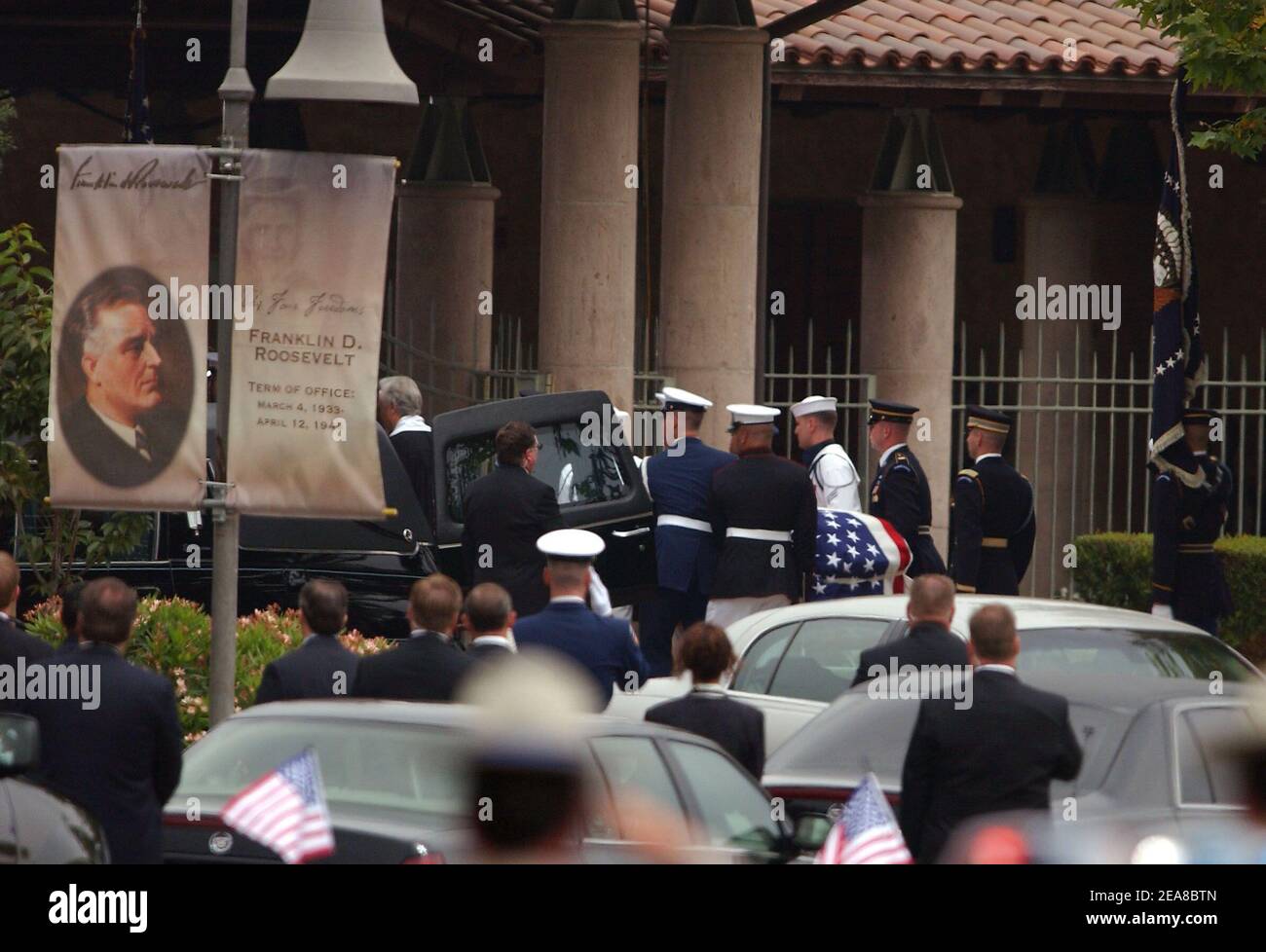 The body of Ronald Reagan accompanied by a fragile Nancy Reagan ...