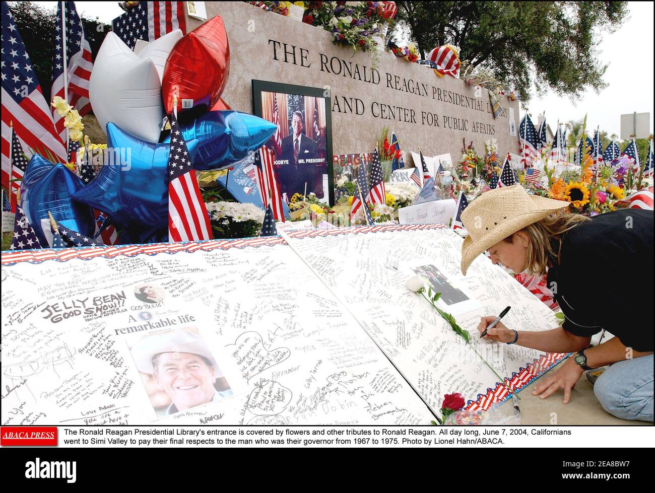 The Ronald Reagan Presidential Library's entrance is covered by flowers ...