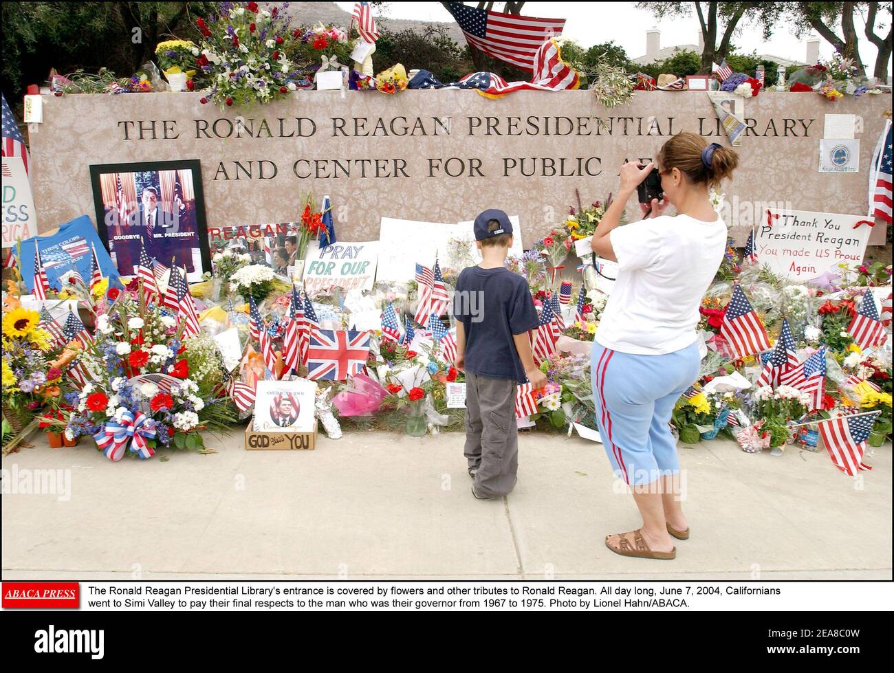 The Ronald Reagan Presidential Library's entrance is covered by flowers ...