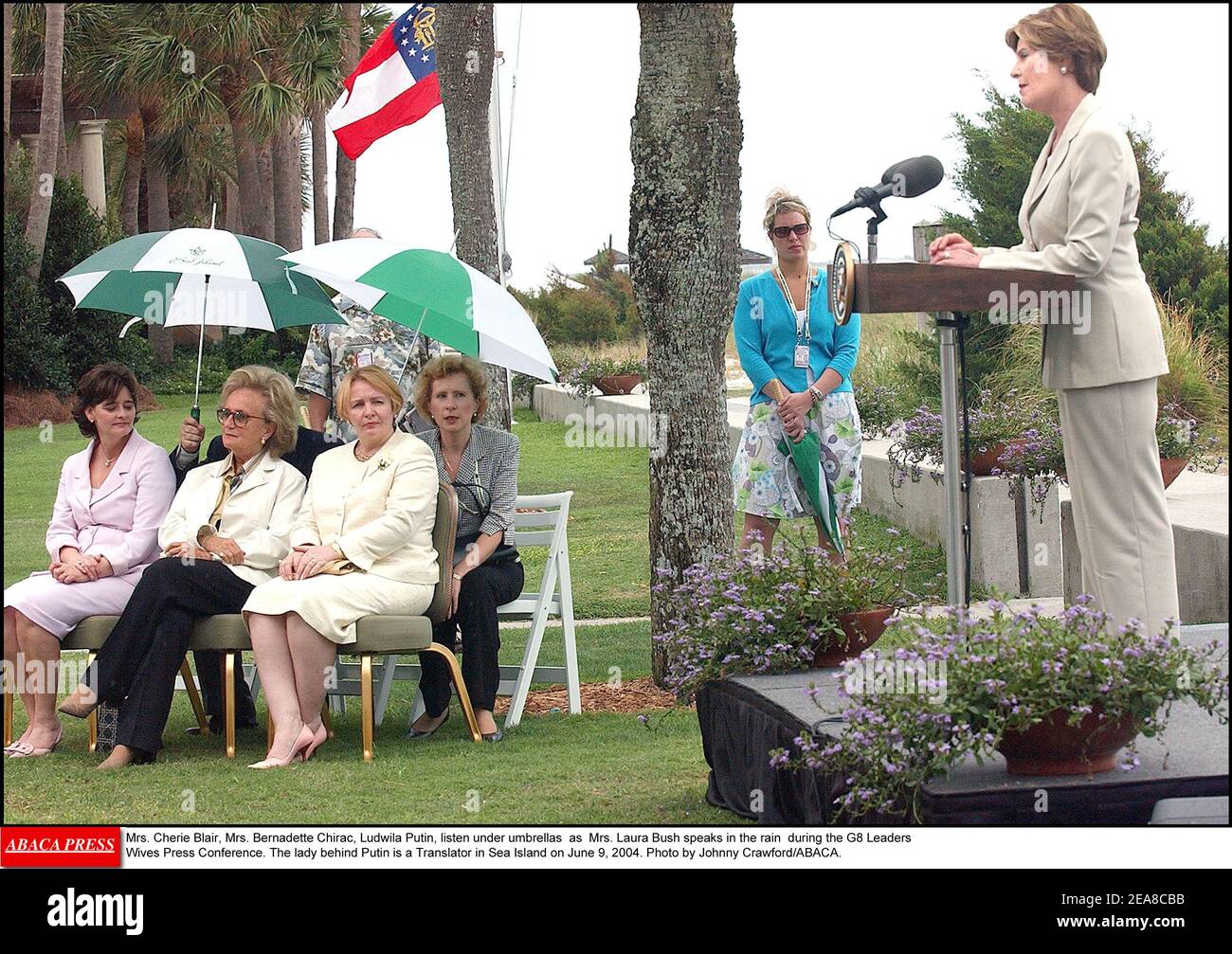 Mrs. Cherie Blair, Mrs. Bernadette Chirac, Ludwila Putin, listen under ...