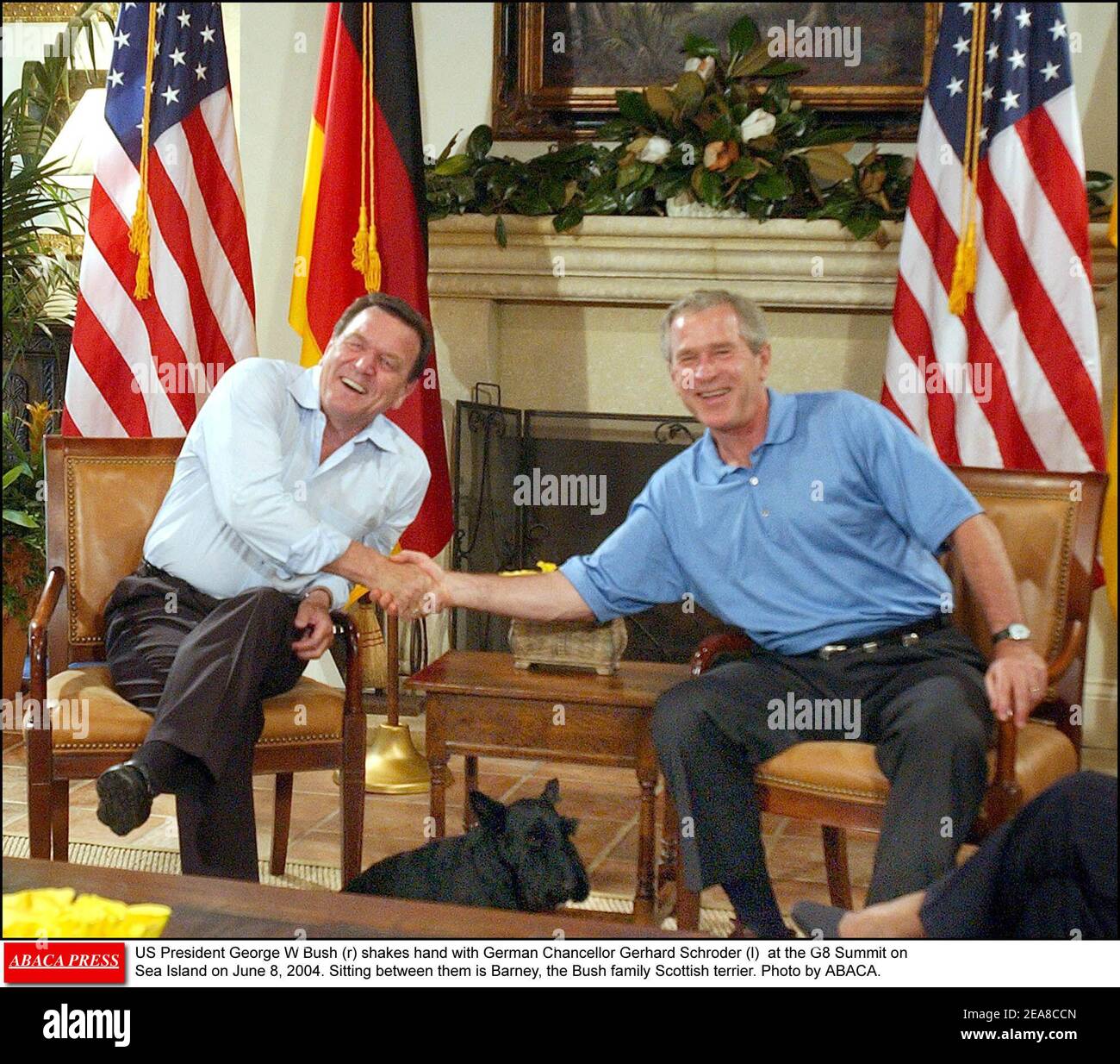 US President George W Bush (r) shakes hand with German Chancellor ...