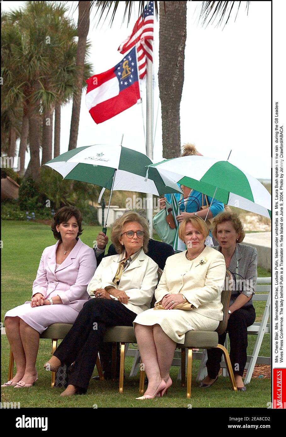 Mrs. Cherie Blair, Mrs. Bernadette Chirac, Ludwila Putin, listen under ...