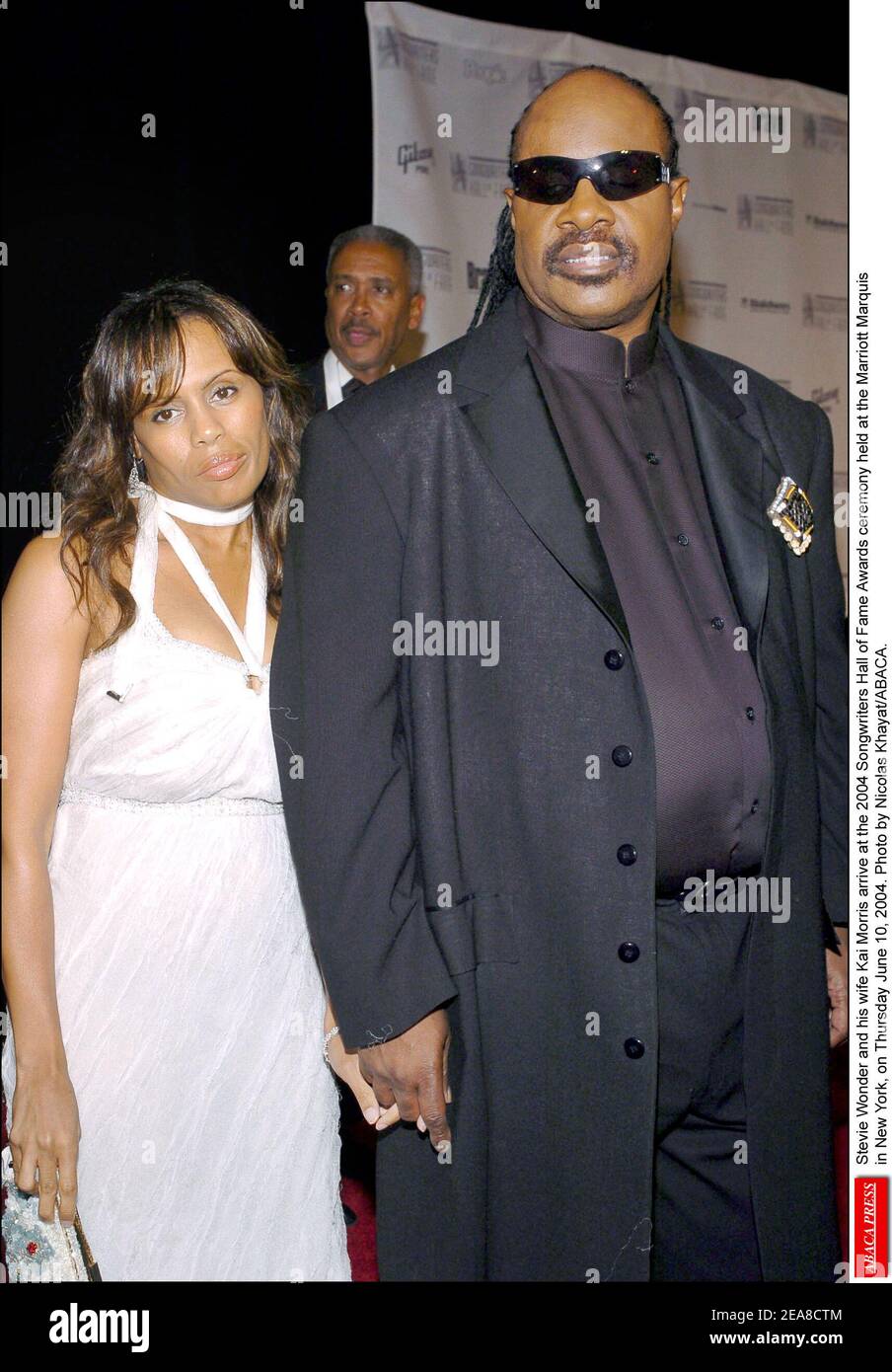 Stevie Wonder and his wife Kai Morris arrive at the 2004 Songwriters ...