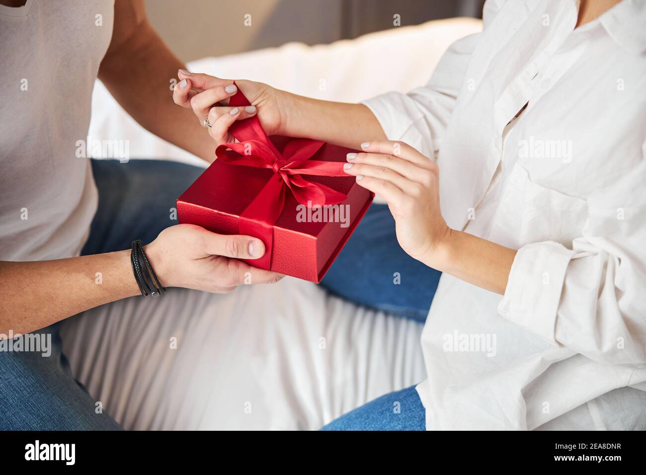Man unwrapping box hi-res stock photography and images - Alamy