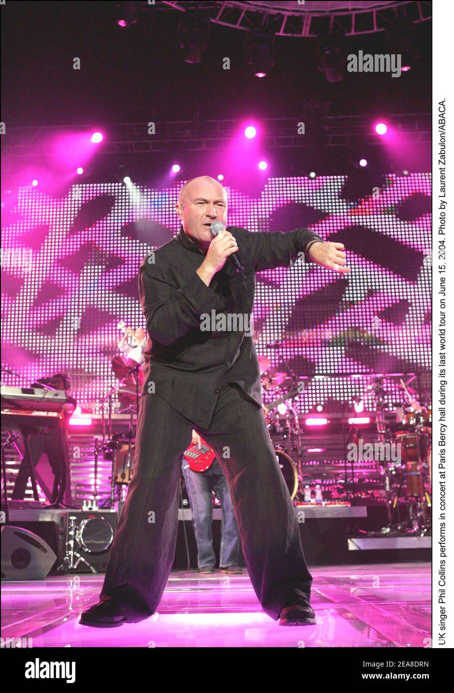 UK singer Phil Collins performs in concert at Paris Bercy hall during ...