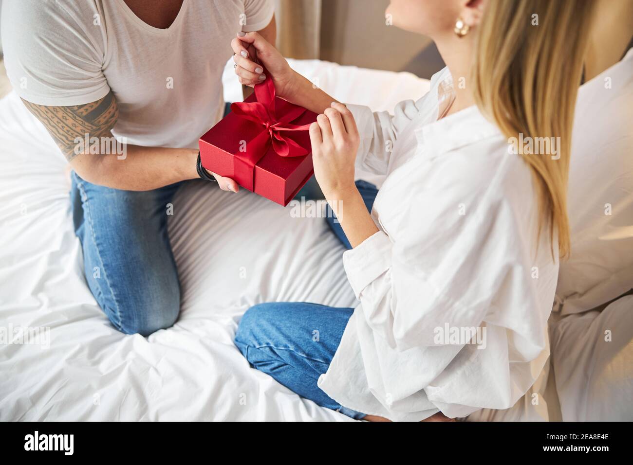Untying hair hi-res stock photography and images - Alamy