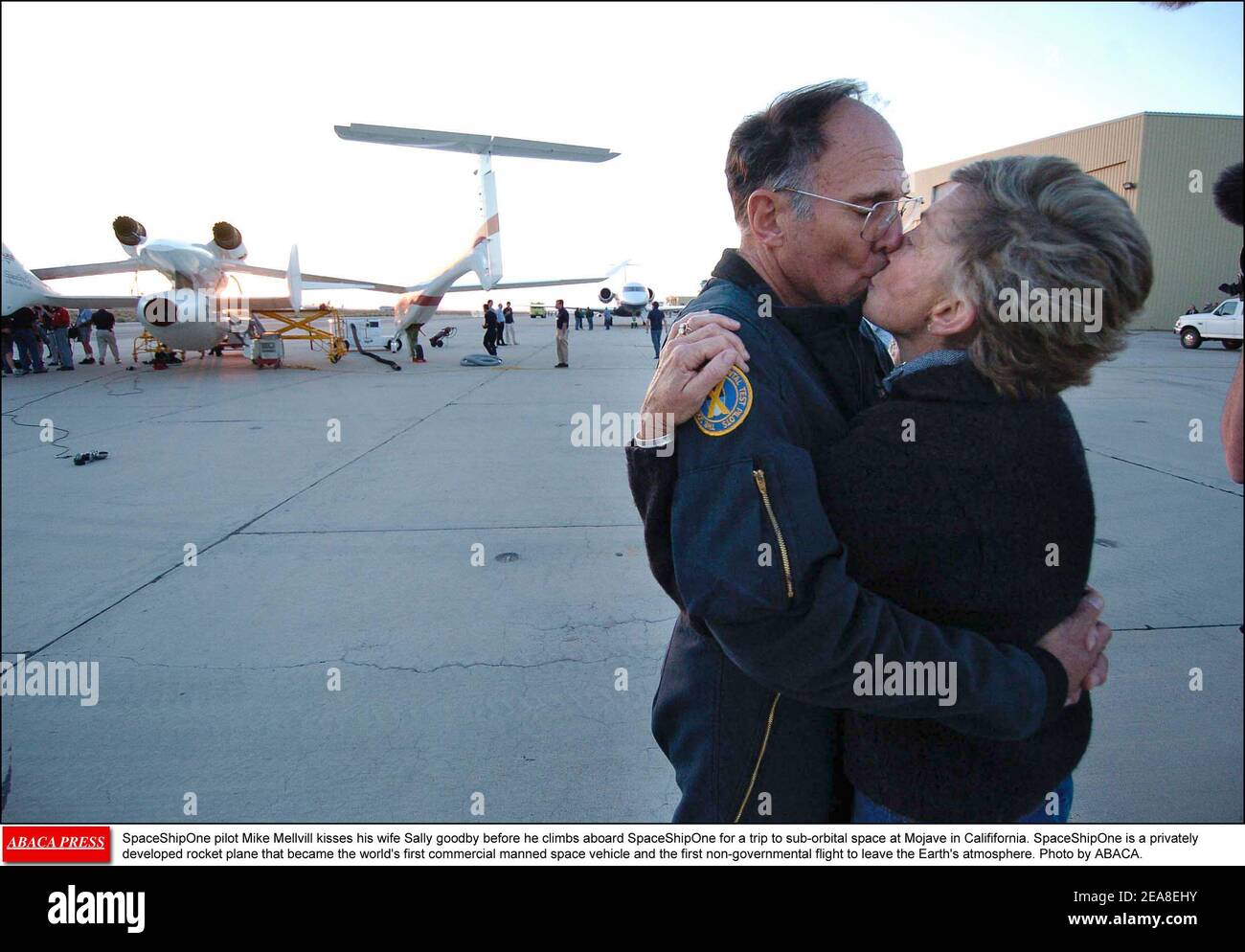 SpaceShipOne pilot Mike Mellvill kisses his wife Sally goodby before he ...