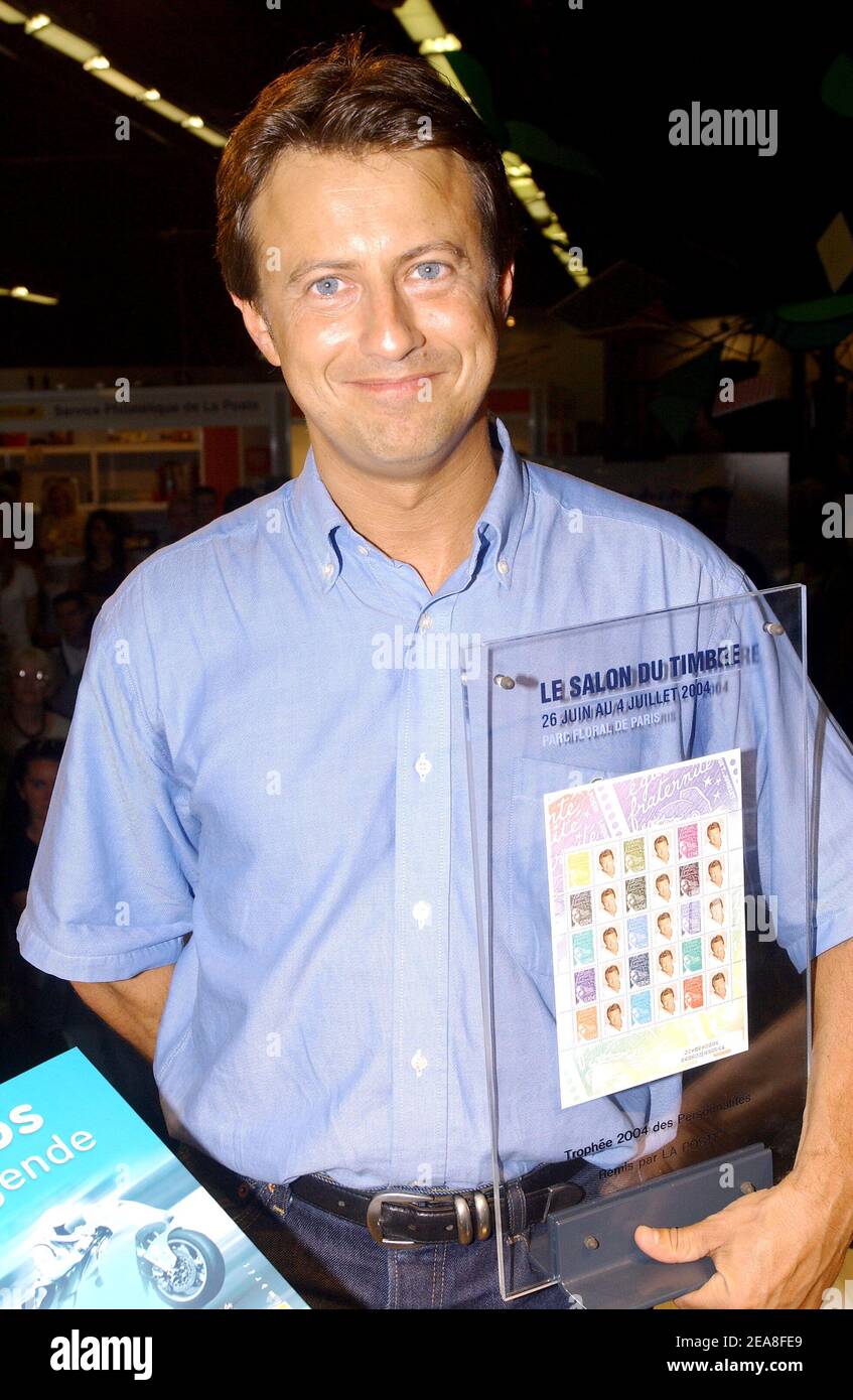 French TV presenter Vincent Perrot receives a stamp with his effigy ...