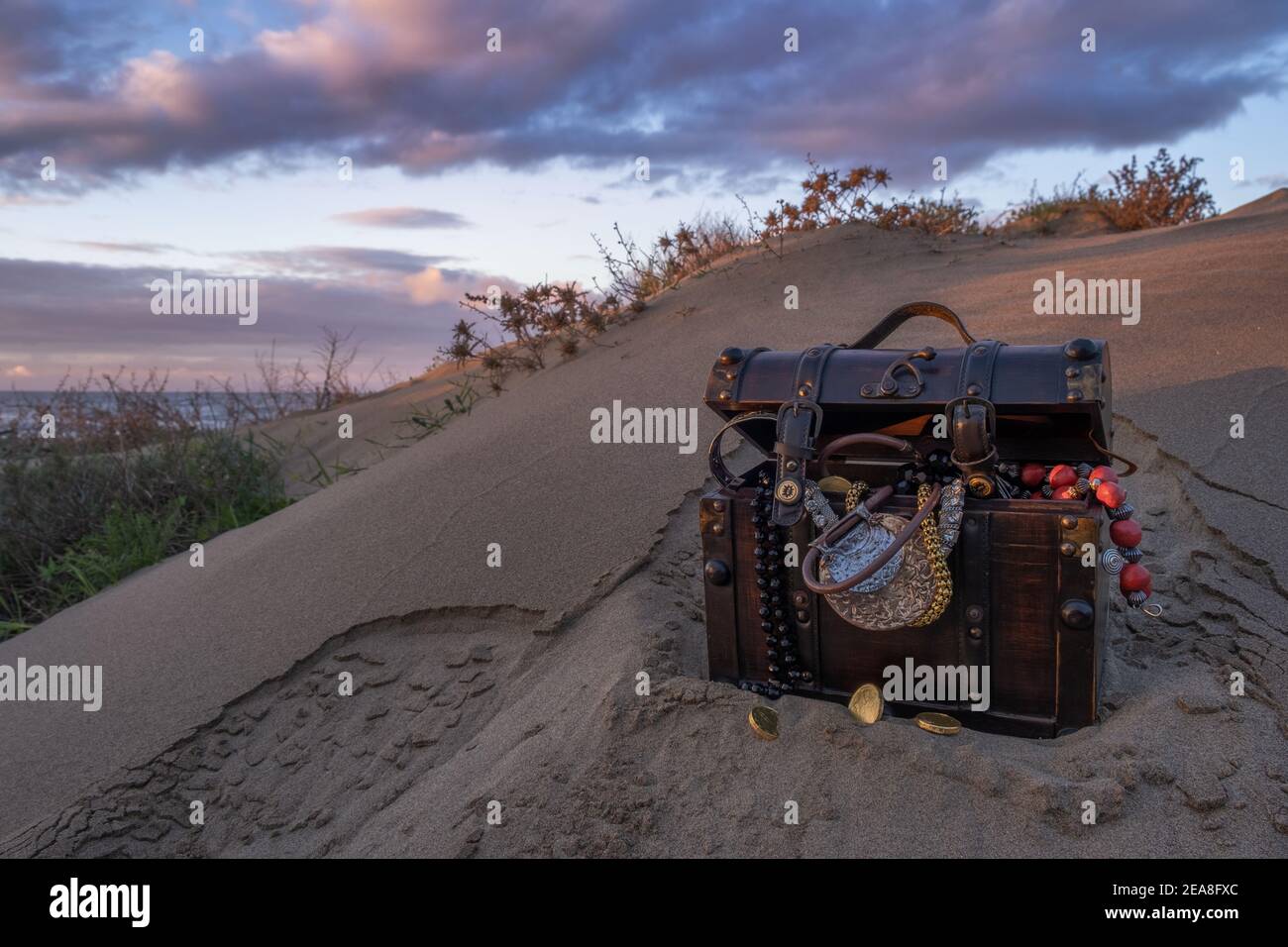 treasure chest at the beach in a sunrise, jewels and gold coins Stock ...