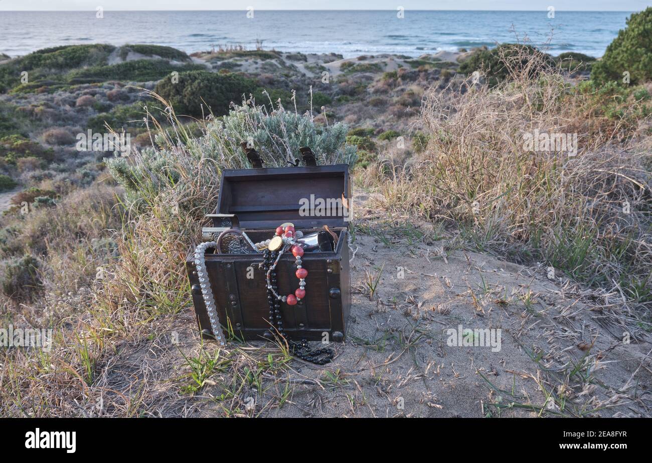treasure chest at the beach in a sunrise, jewels and gold coins Stock ...