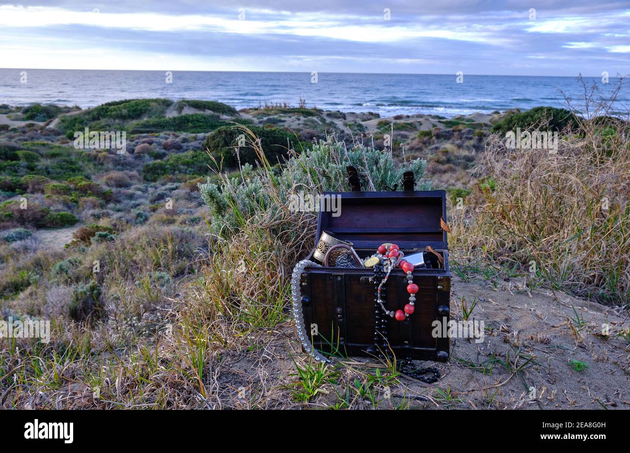 treasure chest at the beach in a sunrise, jewels and gold coins Stock ...