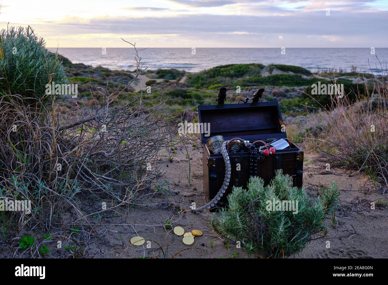 treasure chest at the beach in a sunrise, jewels and gold coins Stock ...