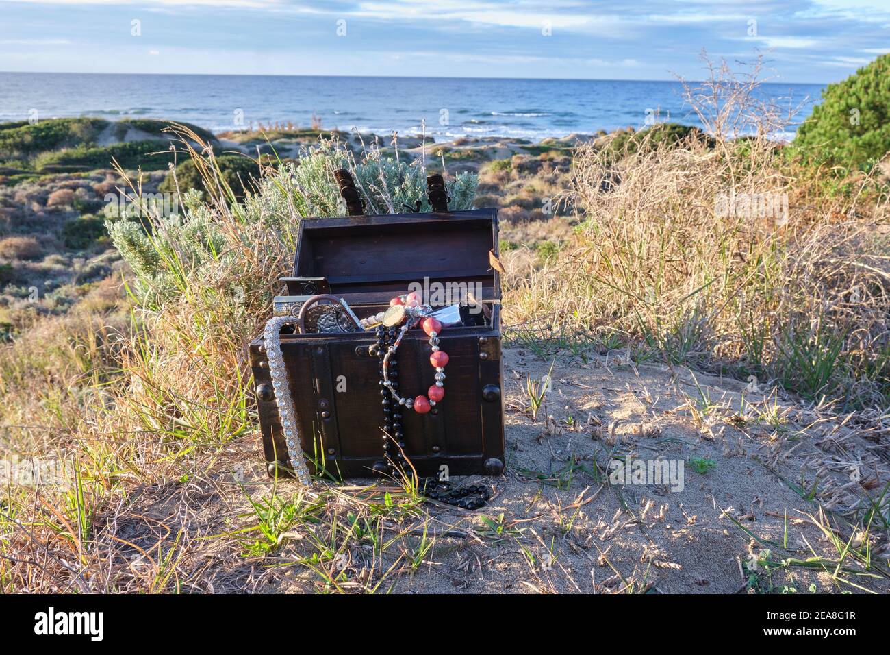 treasure chest at the beach in a sunrise, jewels and gold coins Stock ...