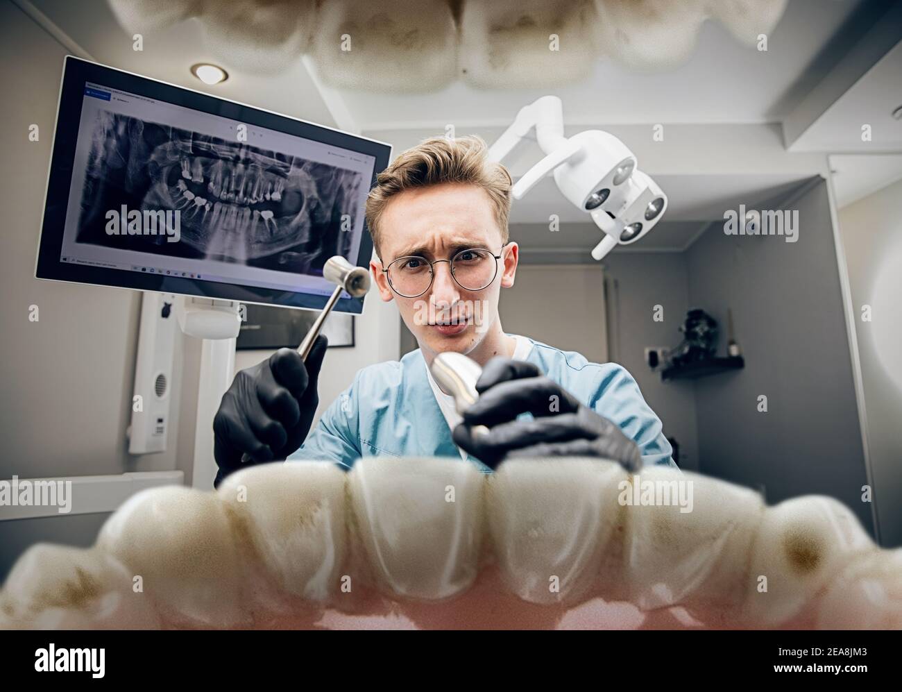 Scary things. Doctor looking into mouth, checking, examining teeth ...