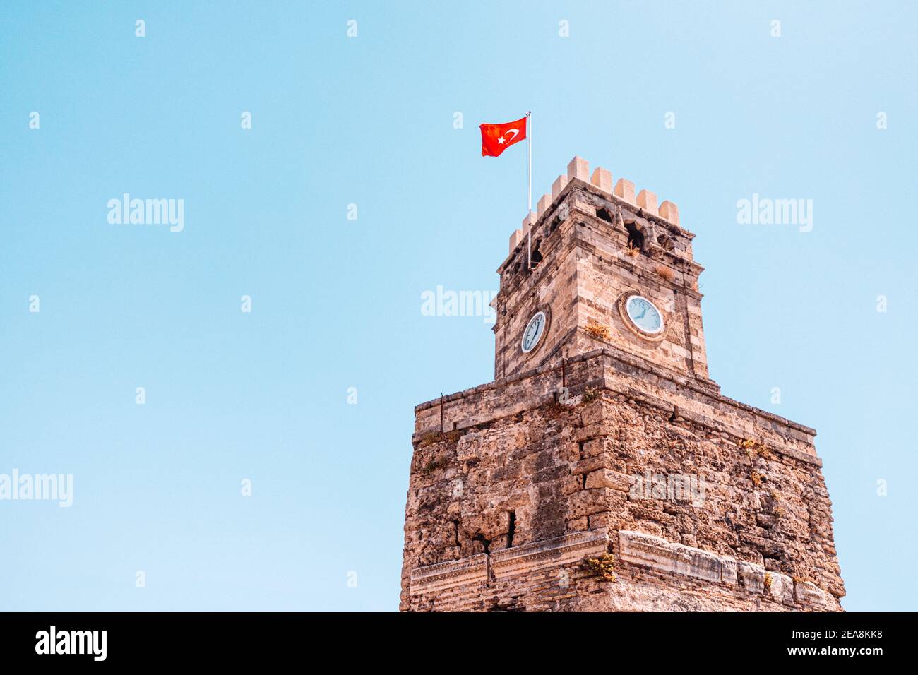 Ancient Clock Tower building in Antalya tourist resort. Architecture ...