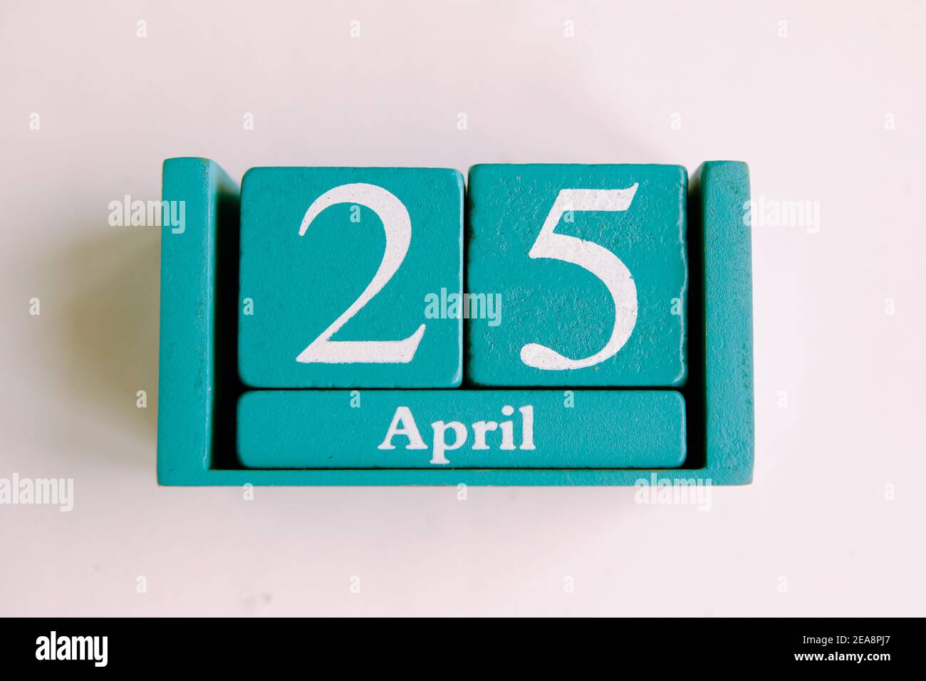 April 25. Blue cube calendar with month date isolated on white ...