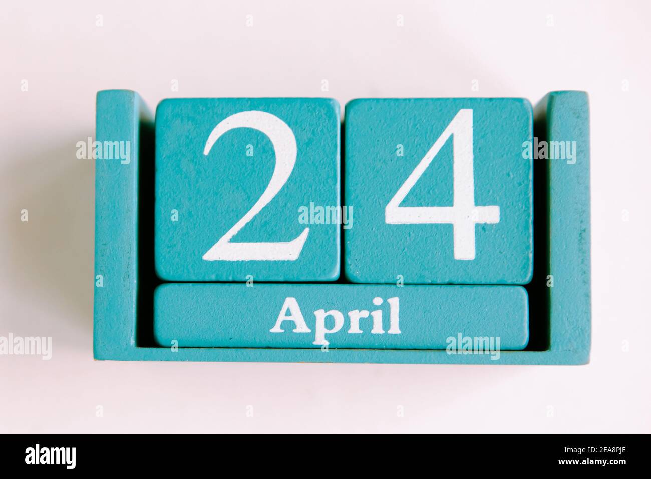 April 24. Blue cube calendar with month date isolated on white ...