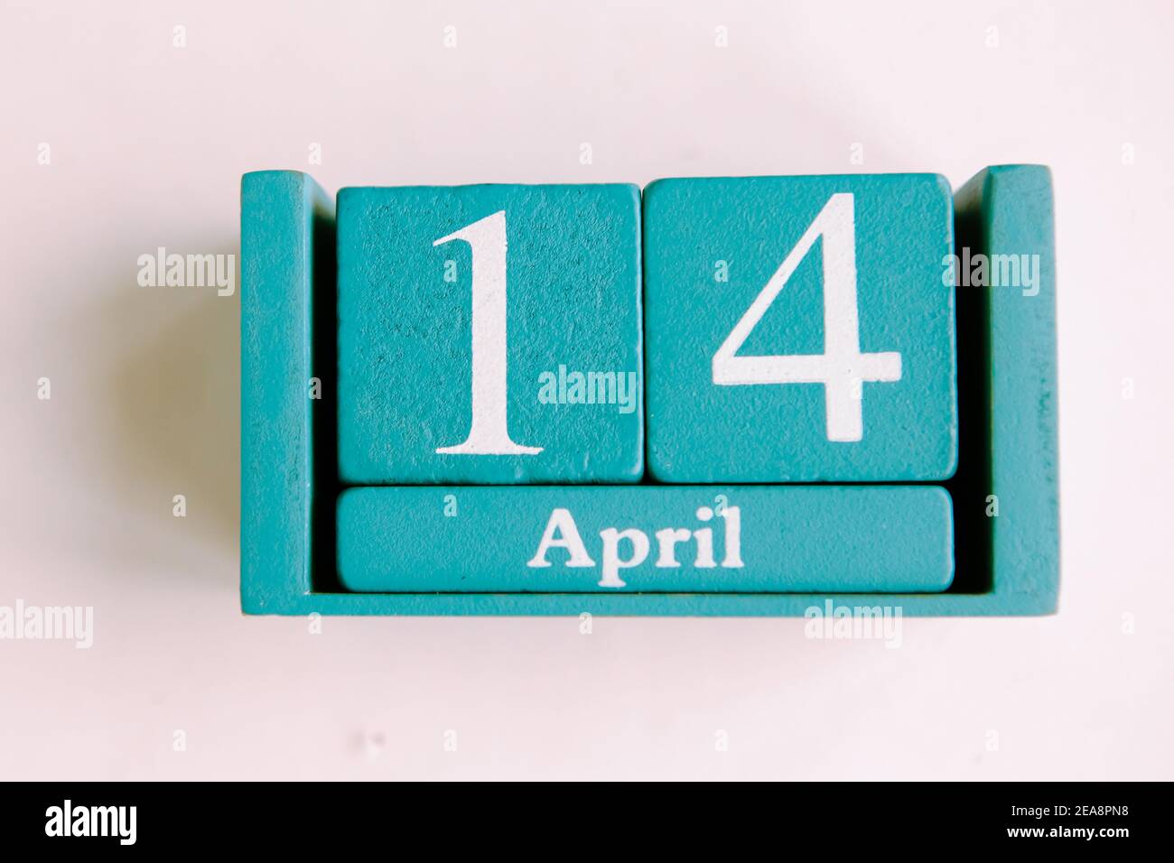 April 14. Blue cube calendar with month date isolated on white ...