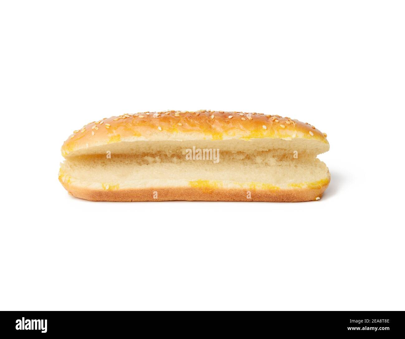 baked oval hot dog bun, baked goods sprinkled with sesame seeds and ...