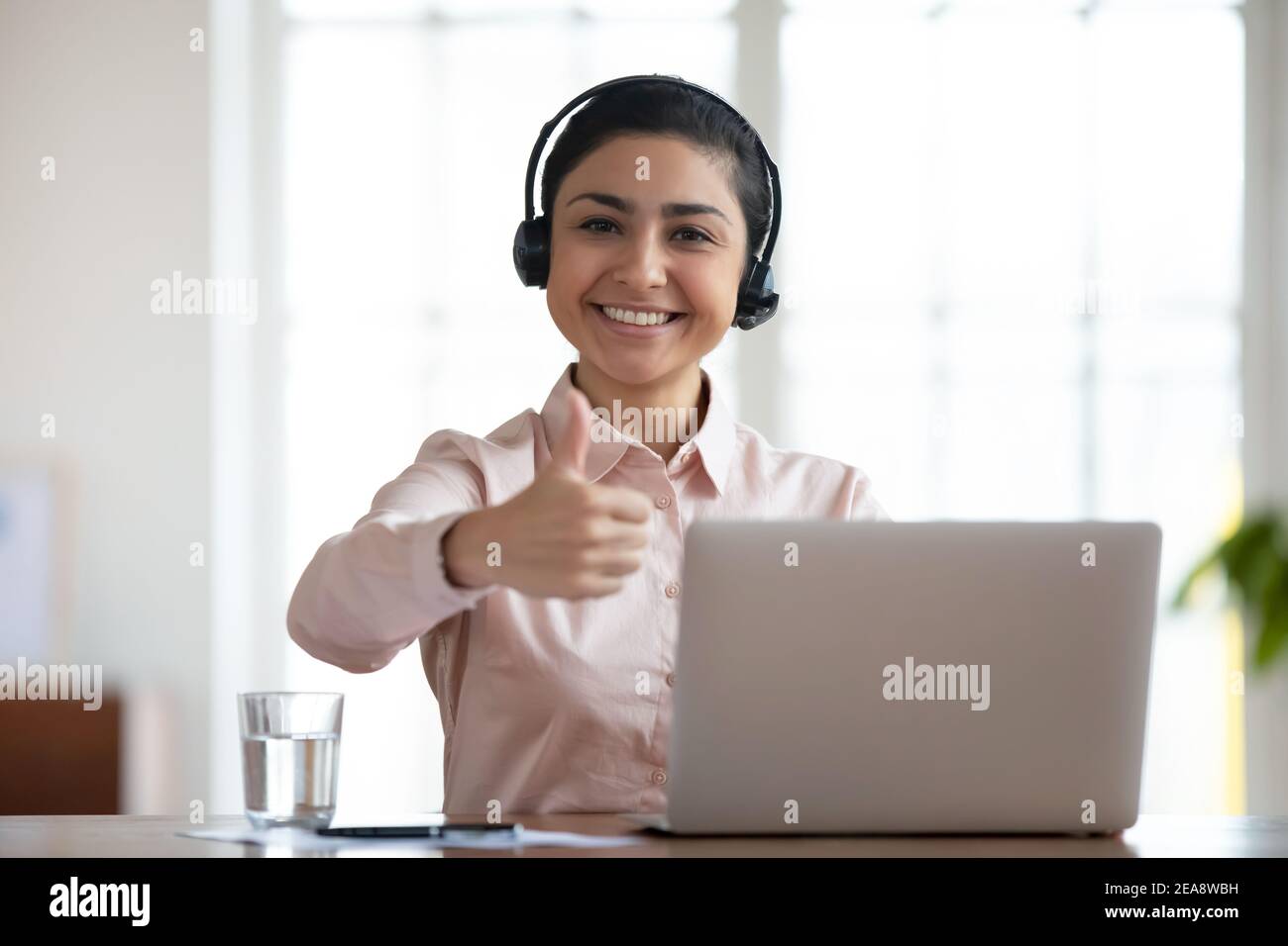Happy young indian call center hi-res stock photography and images - Alamy