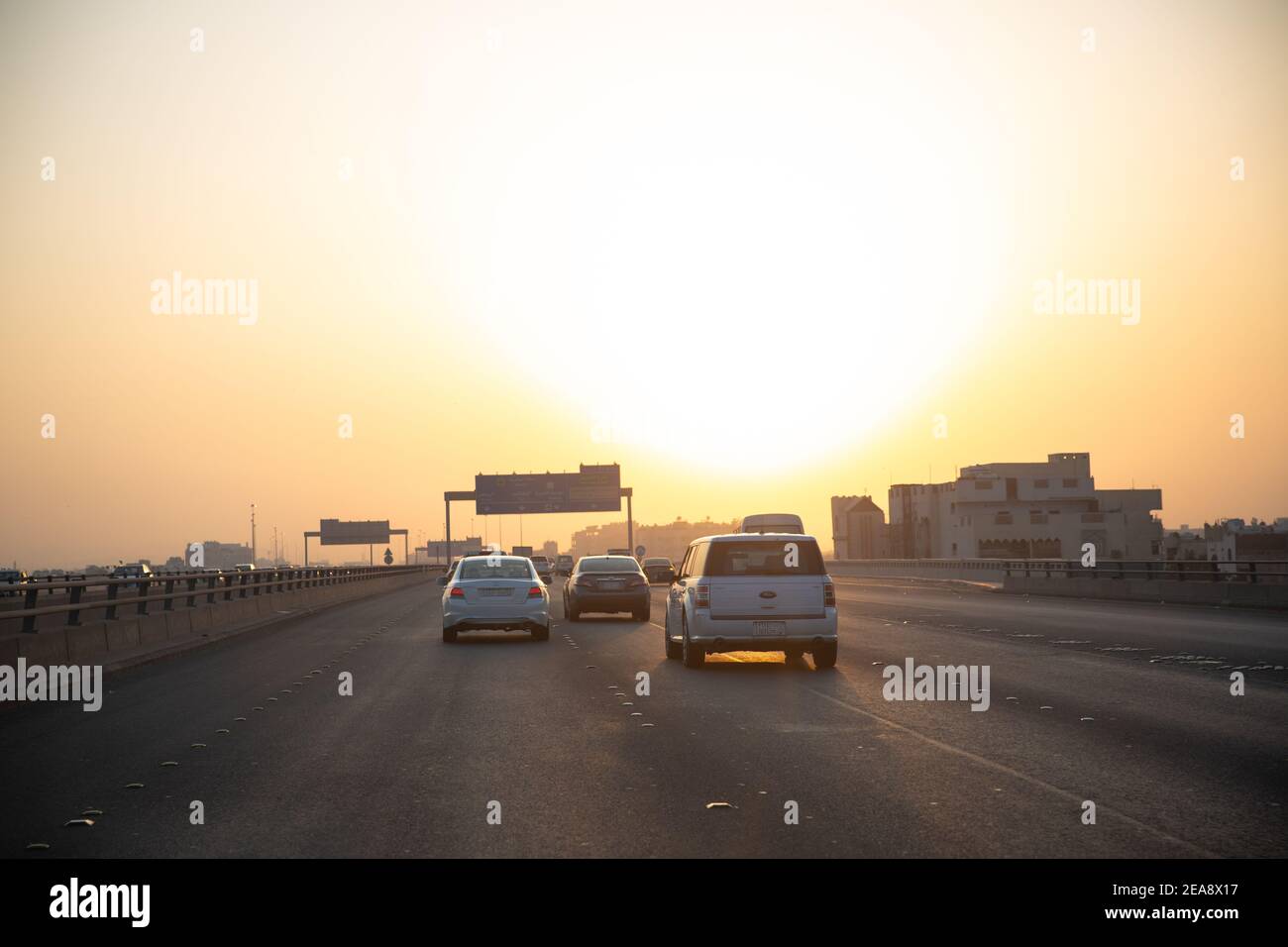 Highway with sunrise Stock Photo - Alamy