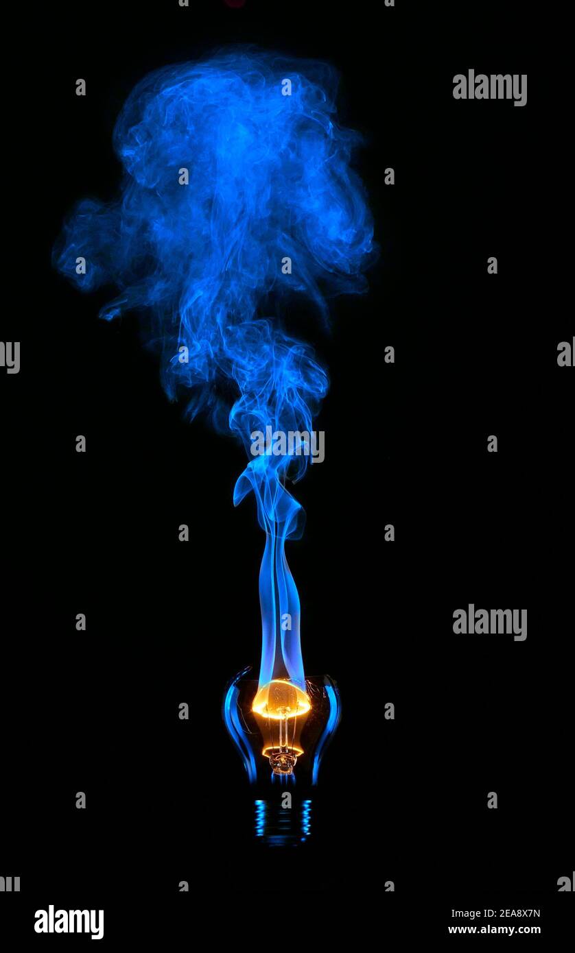 Broken Lightbulb with smoke Stock Photo - Alamy