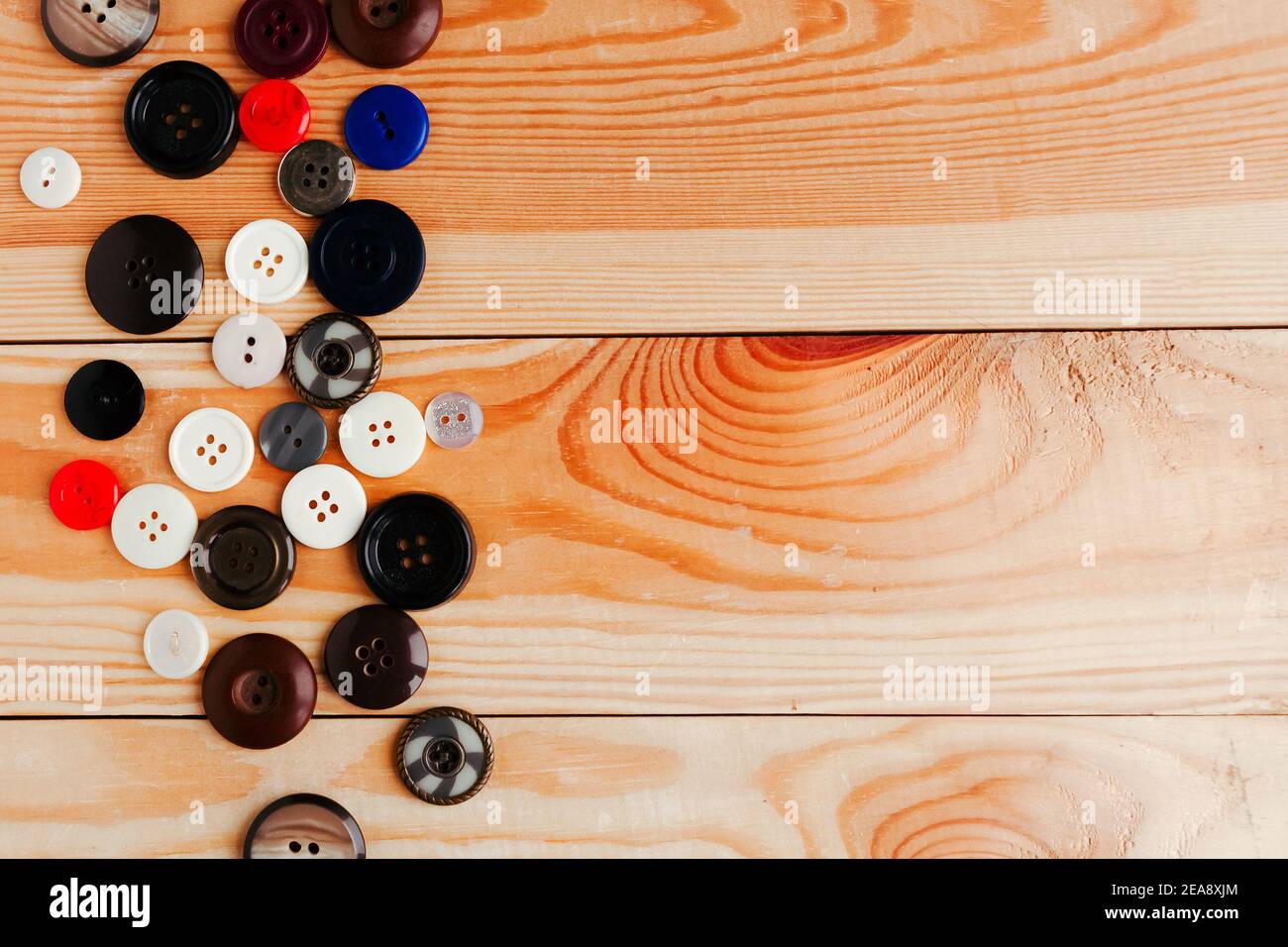 Old different buttons pattern on white background. Copy space for the ...