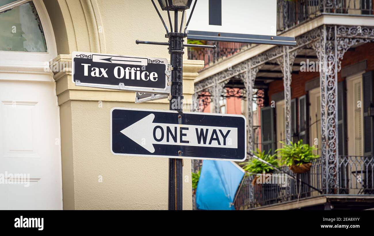 Street Sign the Direction Way to Tax Office Stock Photo - Alamy