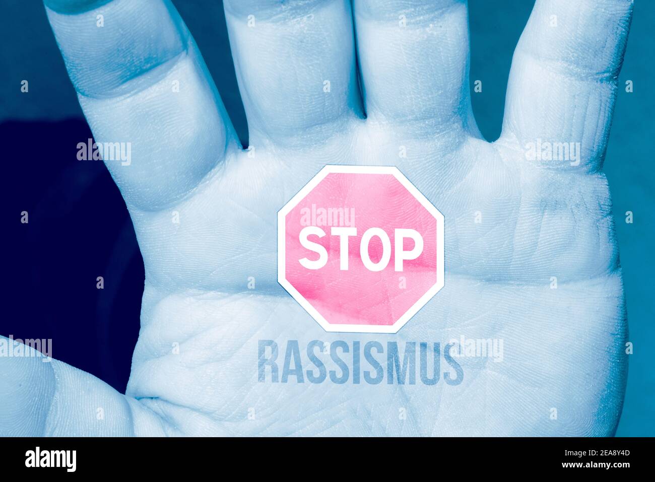 A hand and slogan stop racism Stock Photo - Alamy