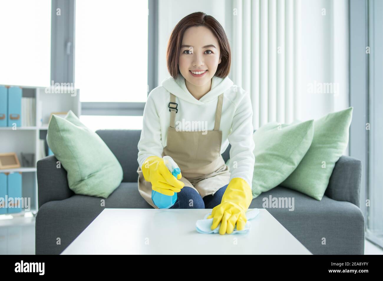 Asian domestic maid family hi-res stock photography and images - Alamy