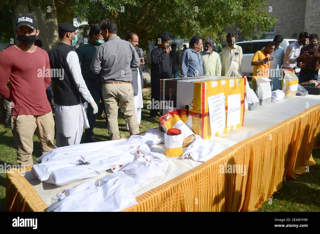 Counter-Terrorism Department (CTD) officials show recovered explosives ...