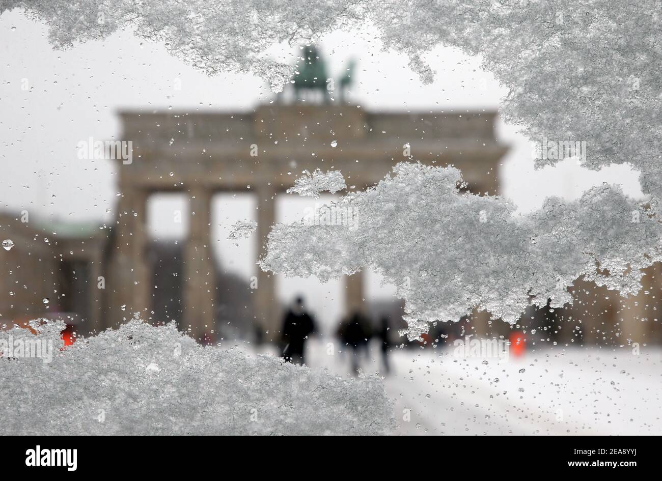 Berlin, Germany. 08th Feb, 2021. Snow crystals lie on a car window on ...