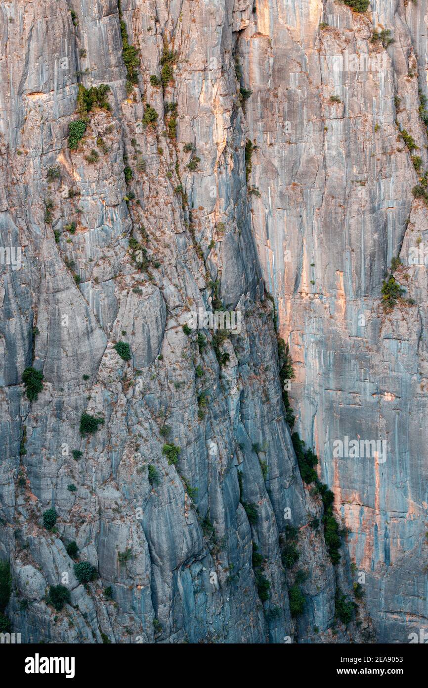 Close-up abstract view of rock and cliff as background or texture ...